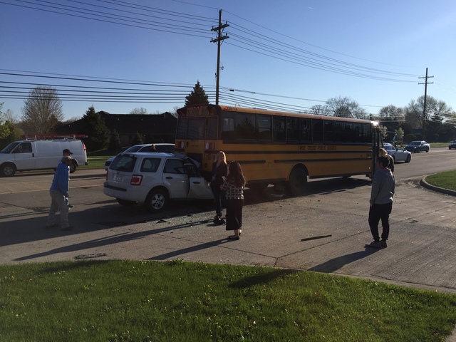Driver crashes into back of school bus in Macomb Township - WXYZ.com